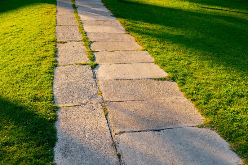 Stone Footpath on a Green Grass in the Park Stock Photo - Image of ...