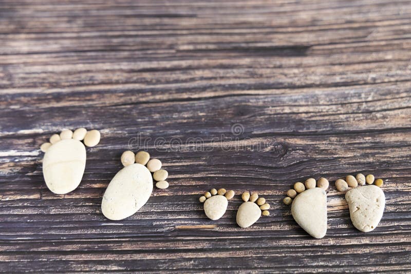 Stone footprints. Family stock photo. Image of funny - 238437924