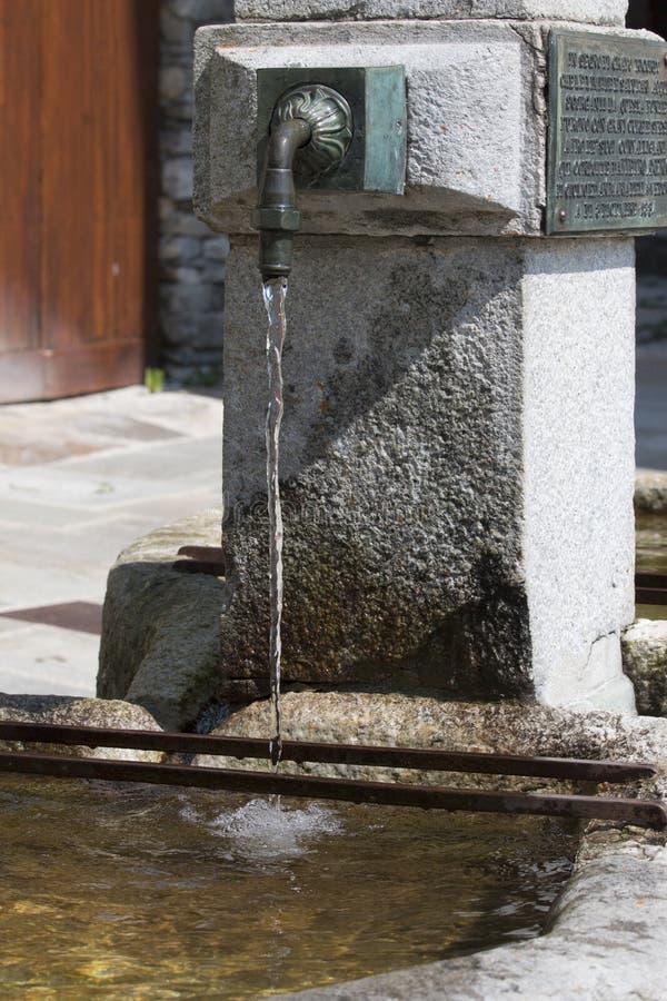 Stone fountain stock image. Image of flowing, splash - 63061657