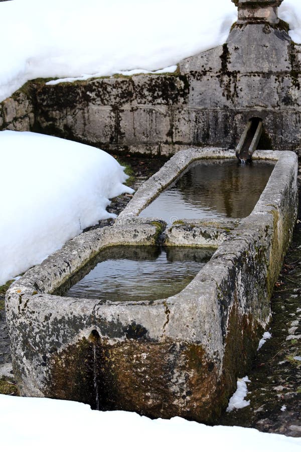 Stone Fountain with Freezing Cold Water in Winter Stock Image - Image ...
