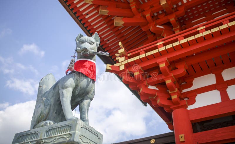 Stone fox sculpture 2 stock photo. Image of tokyo, gold - 47814828
