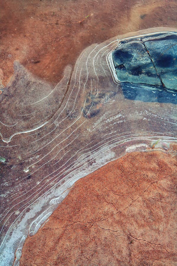 Stone in the Ice on a Sandy Beach Stock Image - Image of cold, nature ...