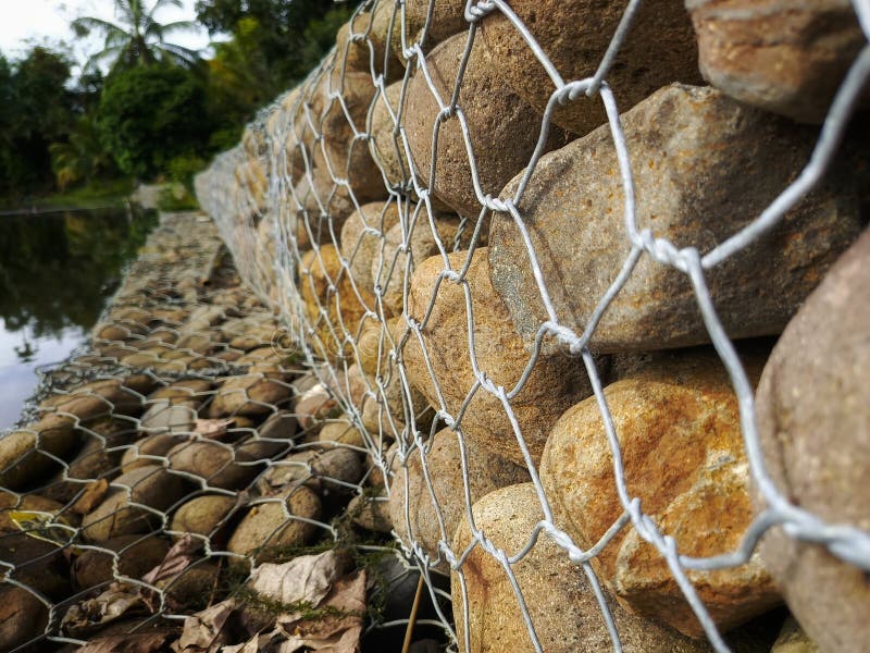 Stone Gabion Construction on the Edge of the Lake Stock Image - Image ...