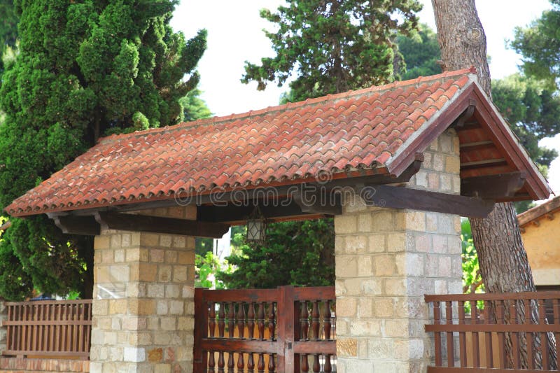 Stone Gate and the Tiles on Roof, Decorated Facade Stock Photo - Image ...