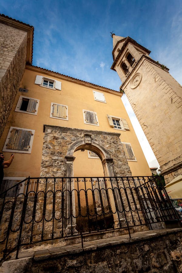 Stone Gates and High Tower on Street of Budva, Montenegro Stock Photo ...