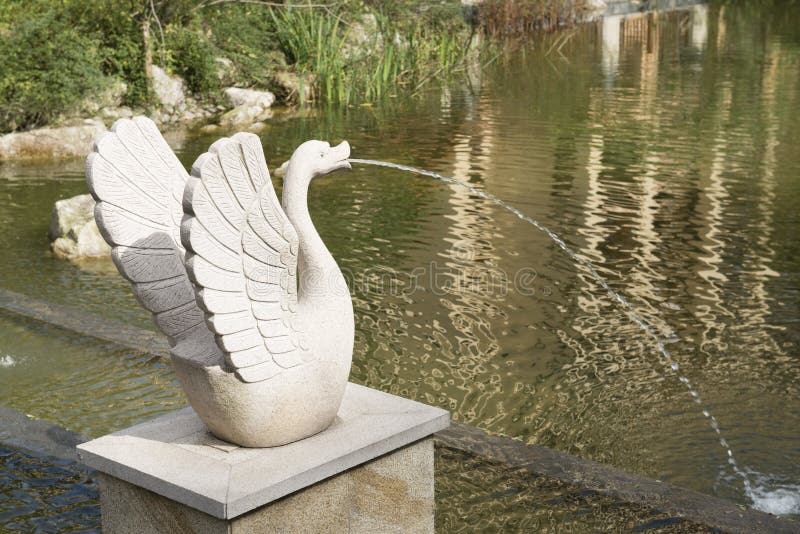 Stone Goose Statue Spray Water Stock Photos - Free & Royalty-Free Stock ...