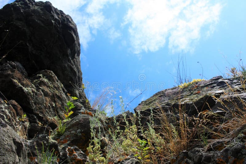 Stone Rocks on a Background of Blue Sky Stock Image - Image of ...