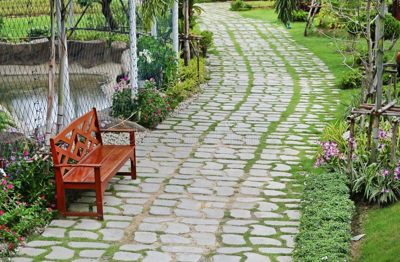 Stone and Grass Pathway in the Garden Stock Photo - Image of house ...