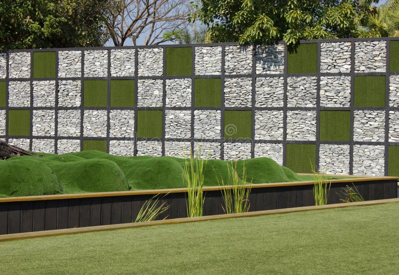Stone and grass wall stock photo. Image of harmony, plant - 23961164