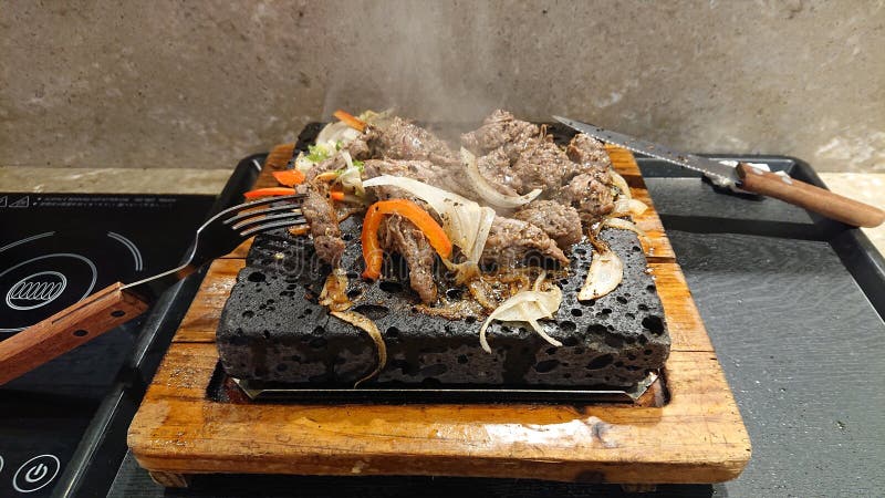 Stone Grill Beef stock image. Image of lava, grilling - 282864225