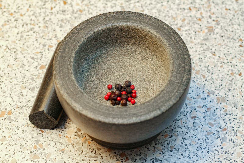 Stone Grinder Bowl. Woman Hands Grinding Pepper in Stone Mortar. Stock ...