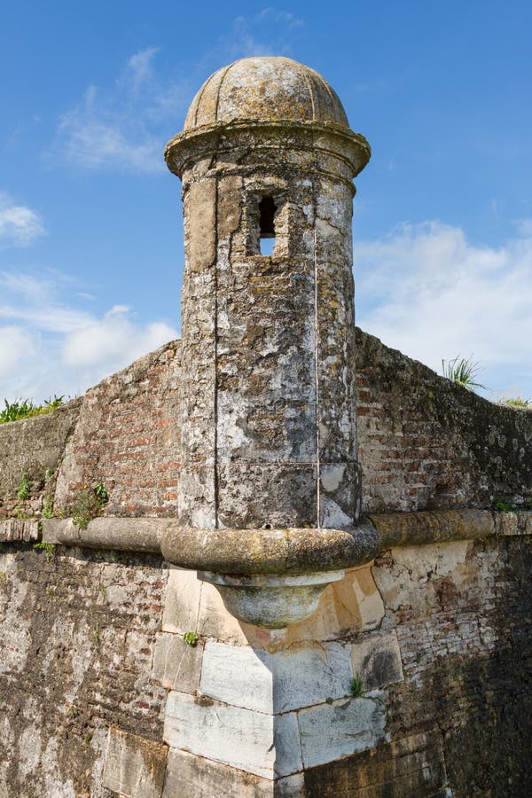 A Stone Guard Tower Overlooking a Blue Sea Stock Photo - Image of ...