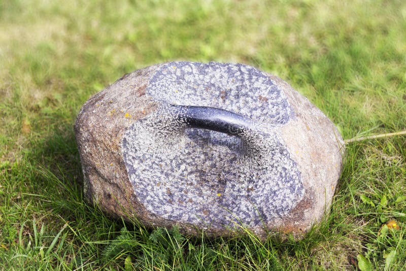 Stone with handle stock photo. Image of geology, material - 64561736