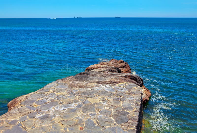 Stone harbour stock image. Image of cliff, beach, beautiful - 171207079