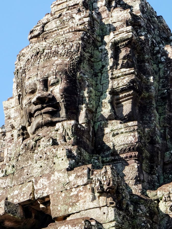 Stone Human Faces Featured on the Towers of Khmer Bayon Temple Stock ...