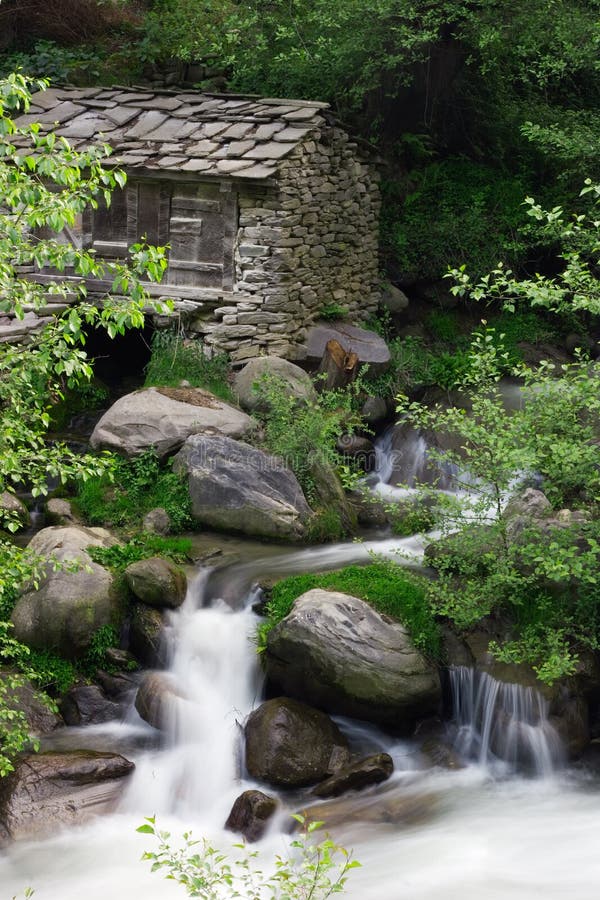 Stone hut at a stream stock image. Image of flowing, mist - 3356563