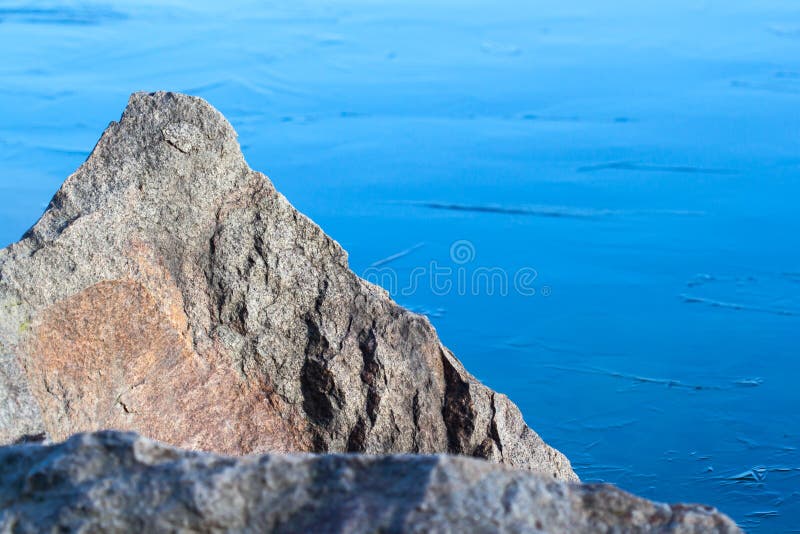 Stone in the ice stock photo. Image of reflection, nature - 110733394