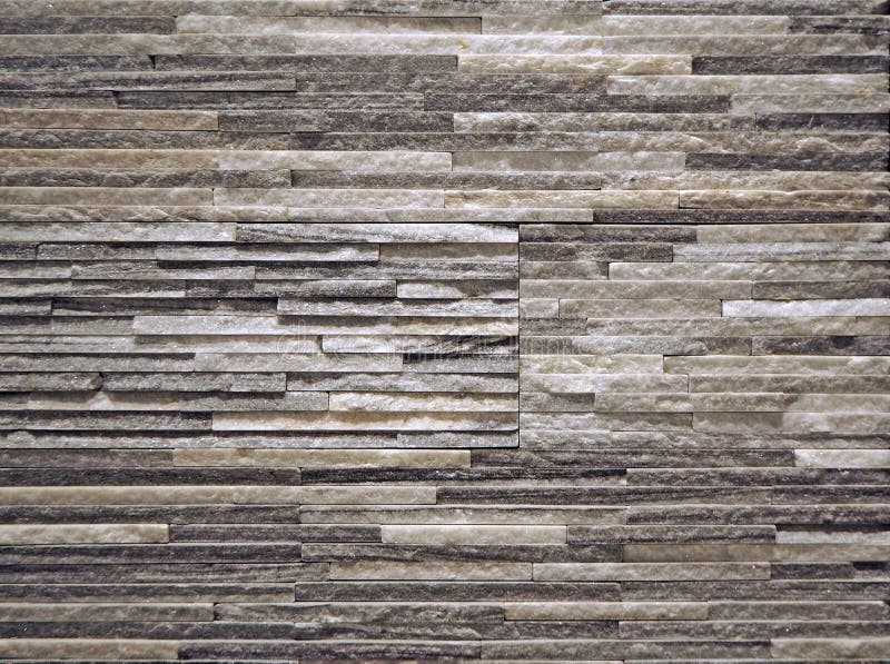Stone Interior Wall Cladding Made Of Thin Strips Stacked Slabs. Stock ...