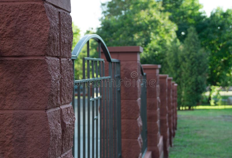 Stone and iron fence. stock photo. Image of fences, wall - 56916994