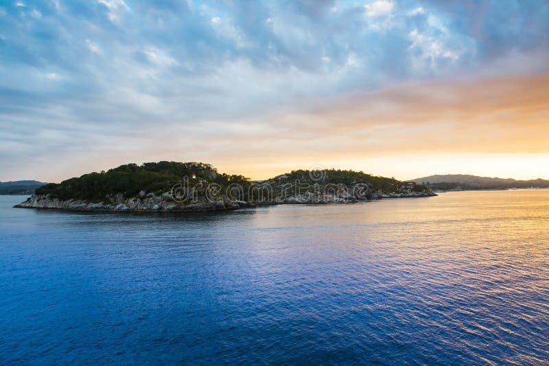 Stone Island at sunset stock photo. Image of islands - 62580912