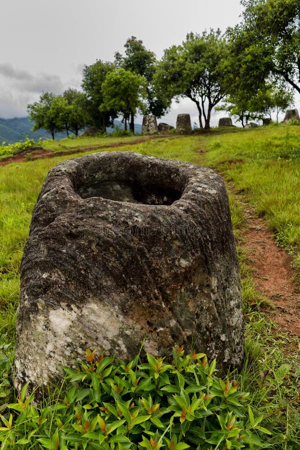 Stone Jar on a Plain of Jars in Laos Stock Photo - Image of land ...