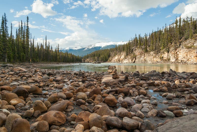 A Stone Laden Beach at Athabasca River& X27;s Edge Stock Photo - Image ...