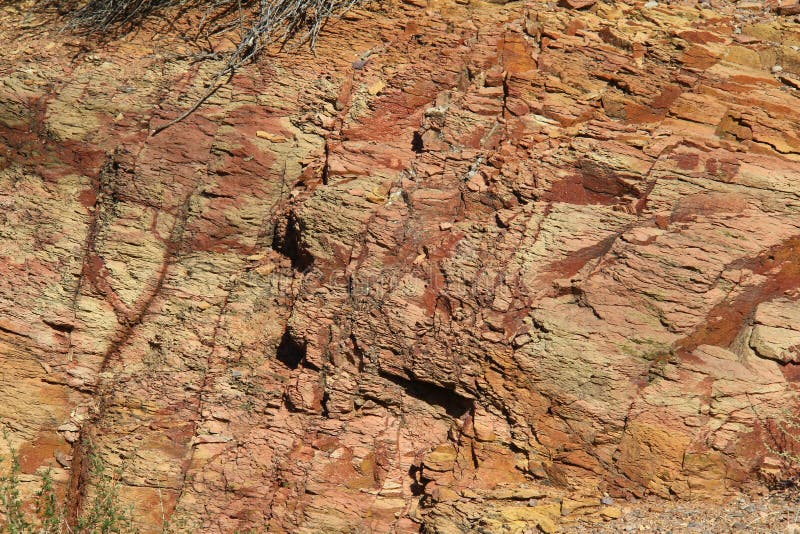 Stone Layered Red-yellow Rock Close-up, a Fragment of a Rock Stock ...