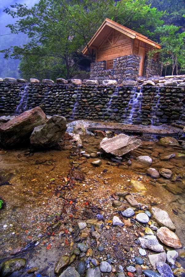 Stone levee stock image. Image of levee, boulder, water - 4494151
