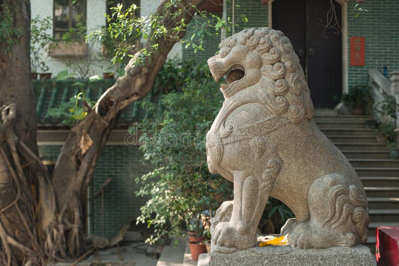Stone lion sculpture stock image. Image of style, luck - 52076459