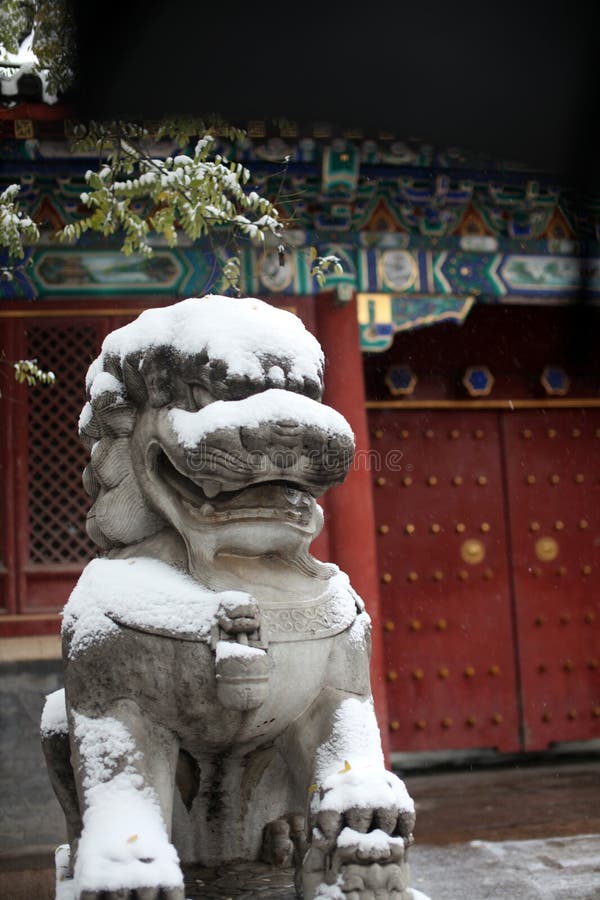 The Stone Lion Statue is Covered with Thick Snow in Peking University ...