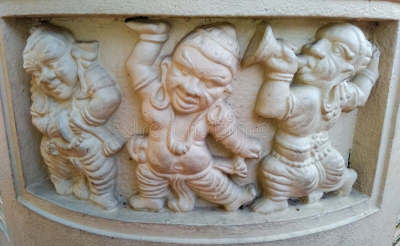 Stone statue of a dwarf stock photo. Image of charms - 130714458