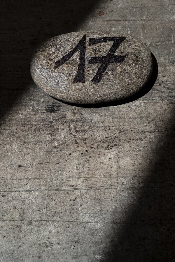 Stone with Number 17 and Mood Light Stock Photo - Image of misfortune ...
