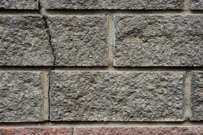 Stone wall of rough bricks stock photo. Image of house - 147209298