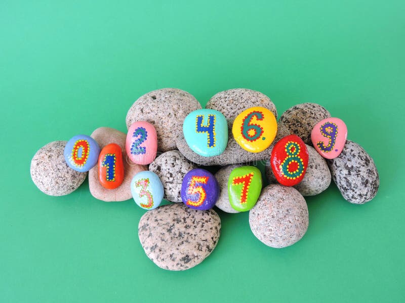 Stone with painted numbers stock photo. Image of numbers - 50911680