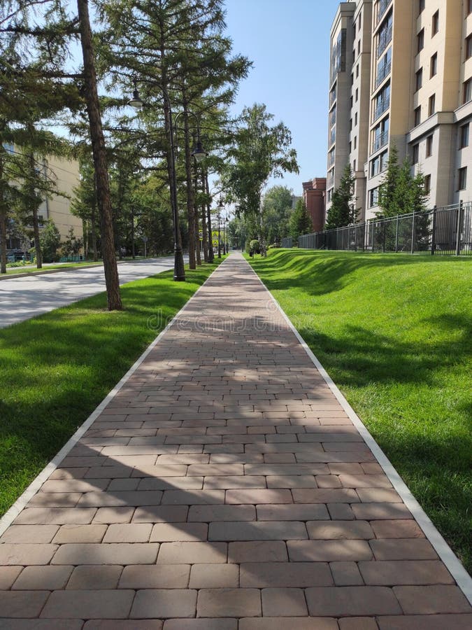 Stone path in the city stock photo. Image of sidewalk - 158948484