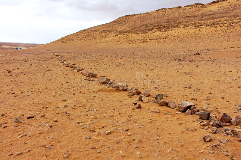 A stone path in the desert stock photo. Image of east - 104644356