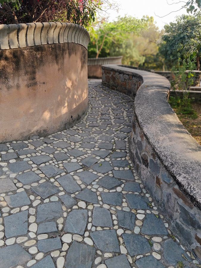 Stone path in the garden stock image. Image of environment - 257595953