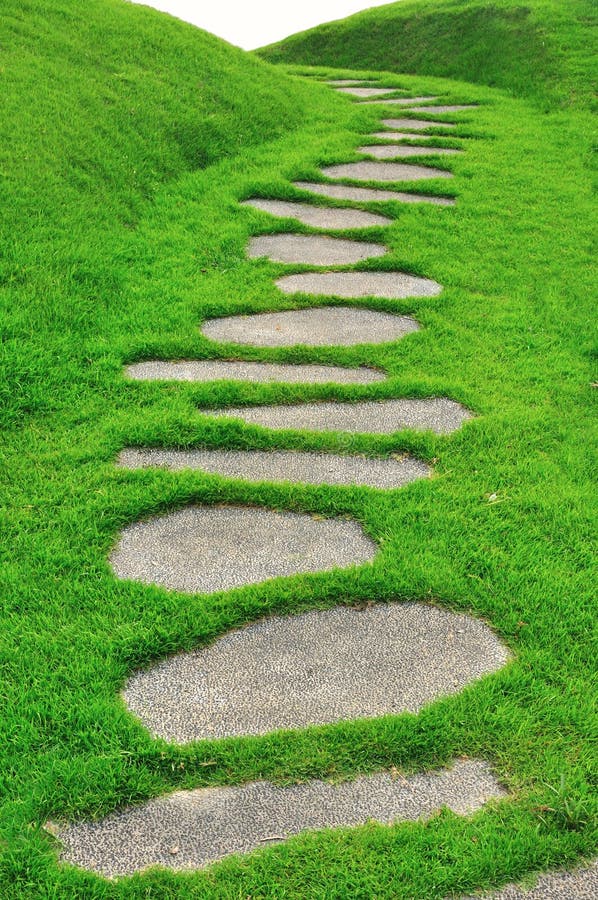 Stone path on green grass stock image. Image of park - 27422745