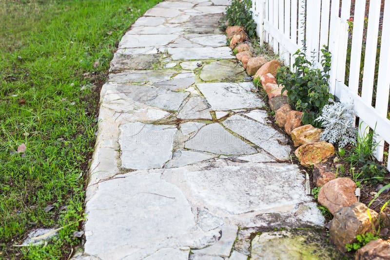 Stone path on green grass stock image. Image of meadow - 89906933