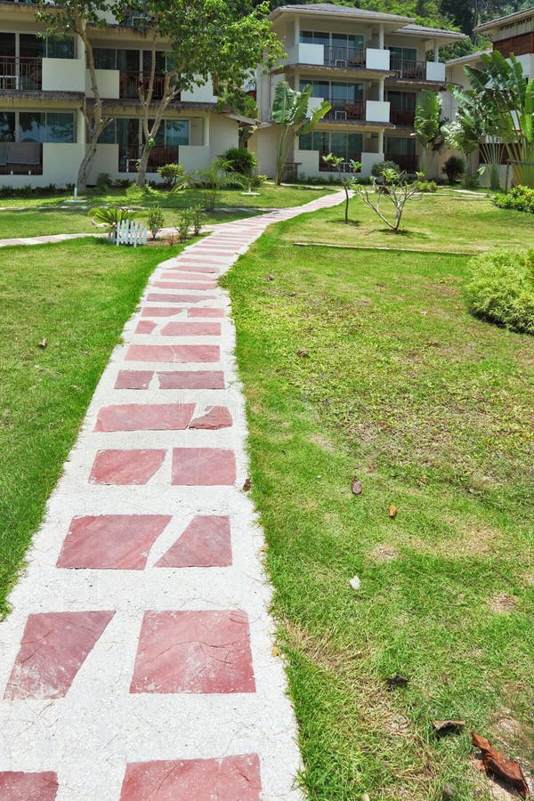 Stone Path in the Middle of a Green Lawn Stock Image - Image of stone ...