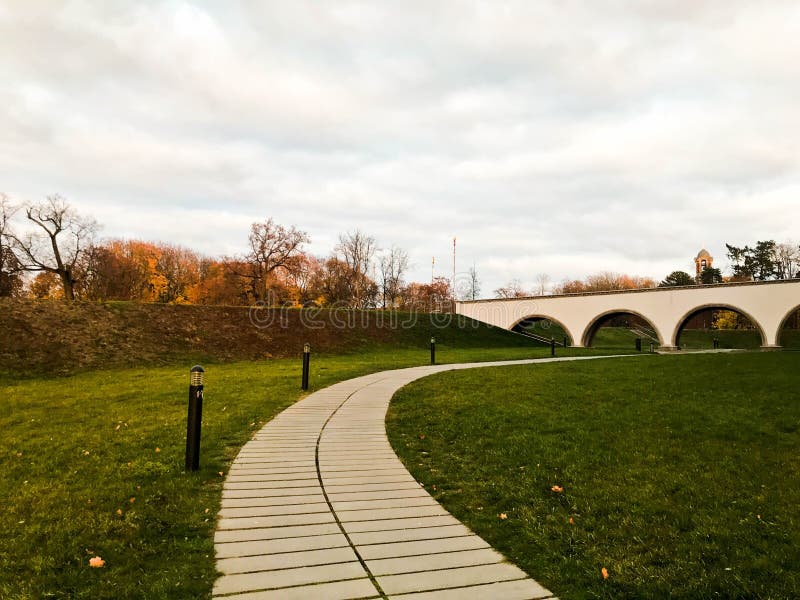 Stone Path, a Path in the Park Leading To a Pedestrian Bridge with ...