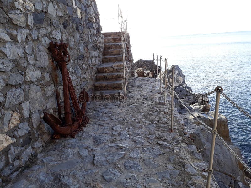 Stone path by sea stock photo. Image of bright, isolated - 136078864