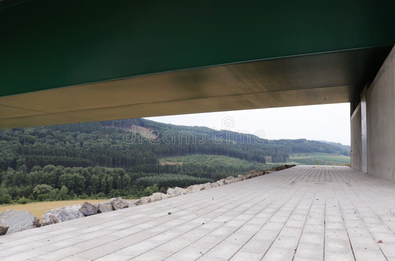 Stone Path Under a Big Metal Structure with Mountain Landscape in the ...
