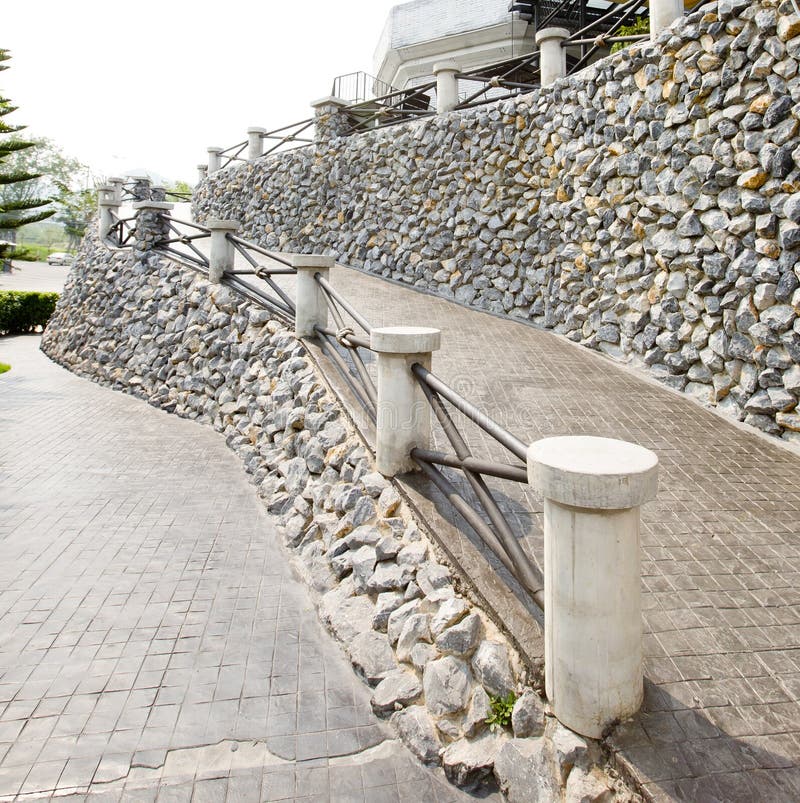 A stone path and wall stock photo. Image of stone, green - 55646112