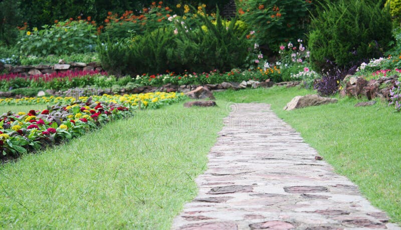 Stone pathway into garden stock image. Image of botanical - 47555491