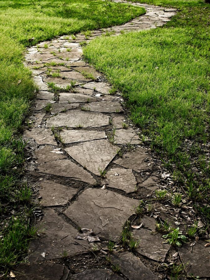 Stone Pathway Outlined with Green Grass Stock Image - Image of road ...