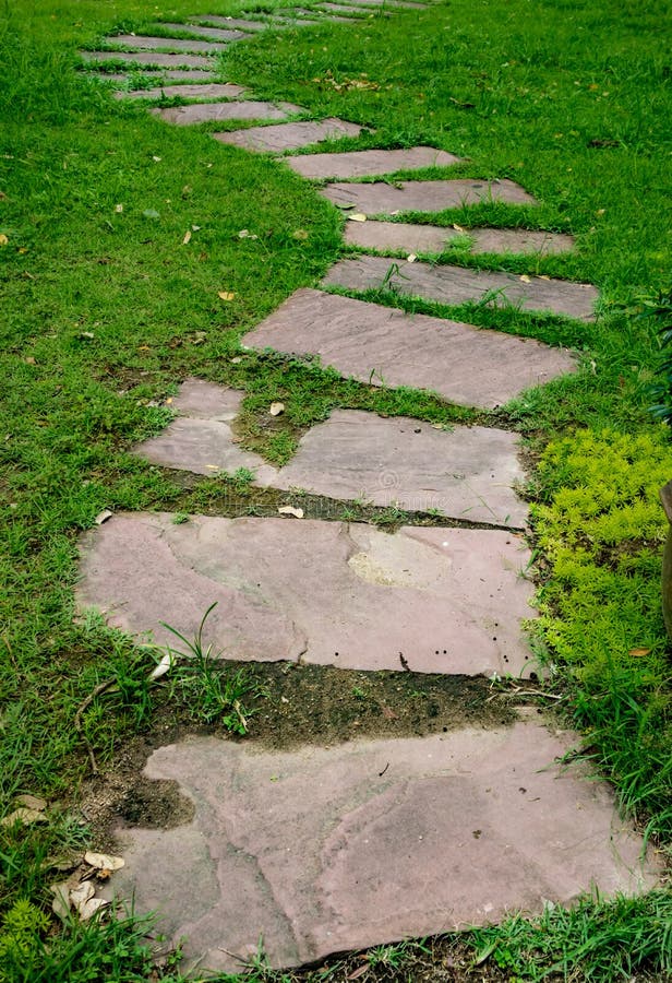 Stone Pathway in the park stock photo. Image of lawn - 94184382