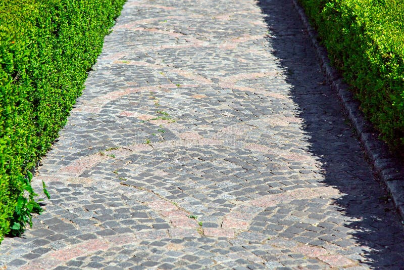 A Stone Paved Footpath with a Pattern Close Up. Stock Photo - Image of ...
