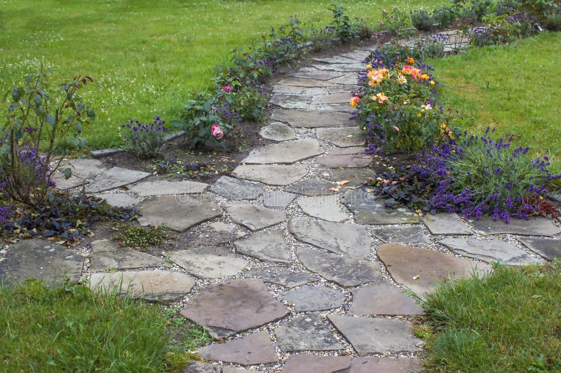 Stone Paved Garden Path and Flowers Stock Photo - Image of path ...