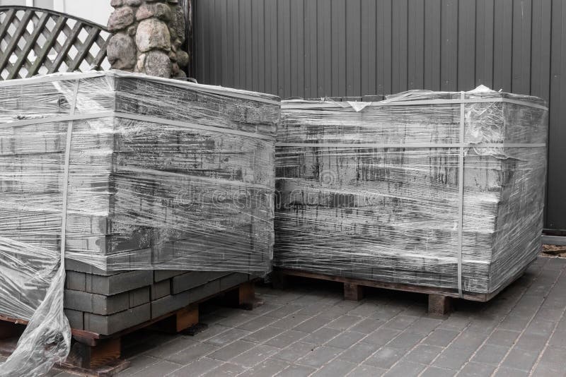 Stone Pavement Blocks in a Pile of Tiles Building Material Packed in ...